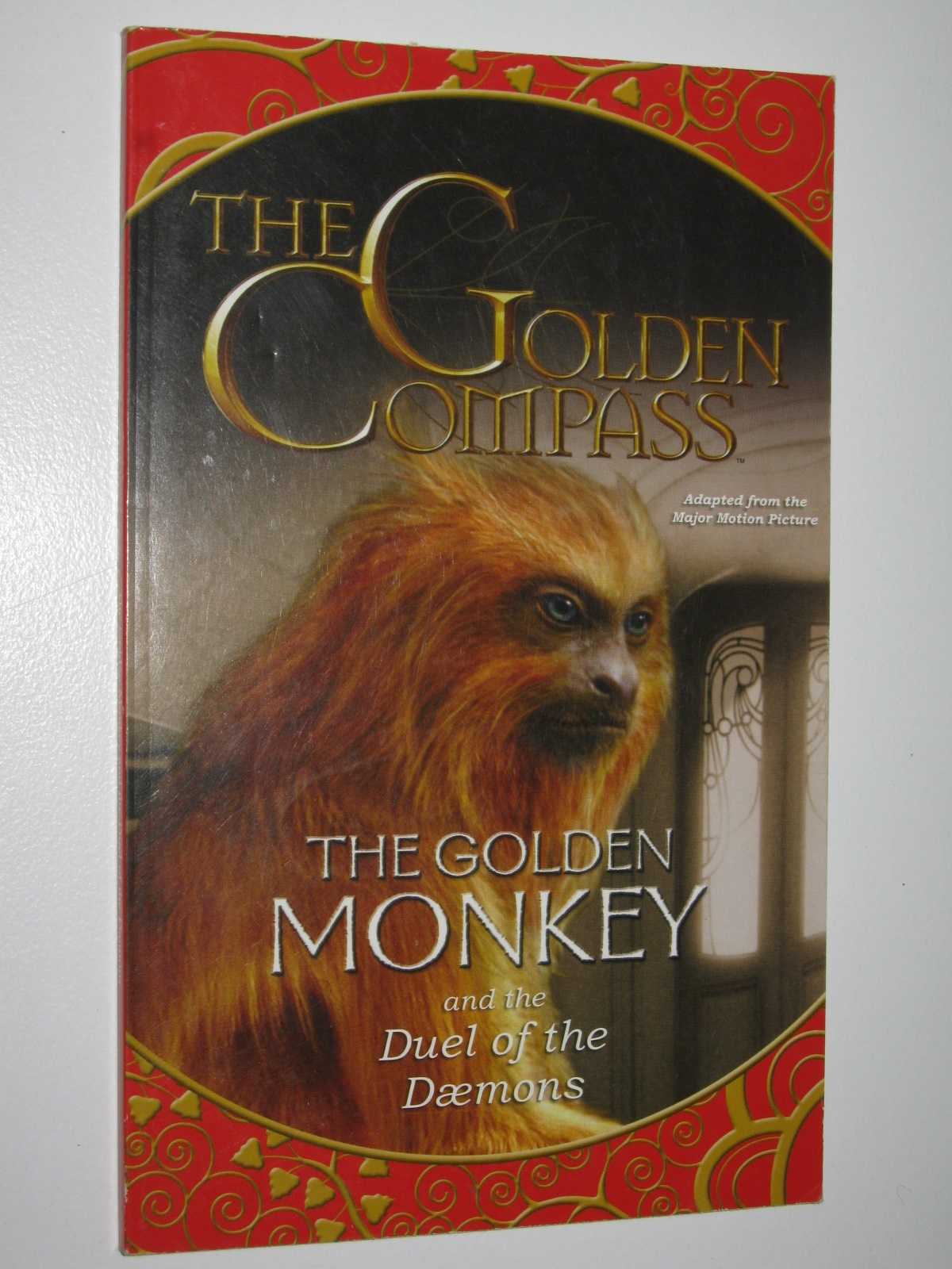 The Golden Compass: The Golden Monkey and Duel of the Daemons
